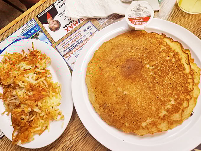 Golden pancakes with the ideal crisp-to-fluffy ratio share the spotlight with hash browns that have achieved that magical caramelized exterior.