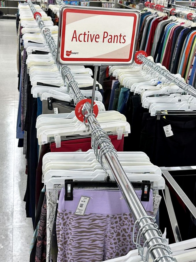 Active pants lined up like soldiers ready for duty. The purple leopard print pair is clearly the rebel of the group.