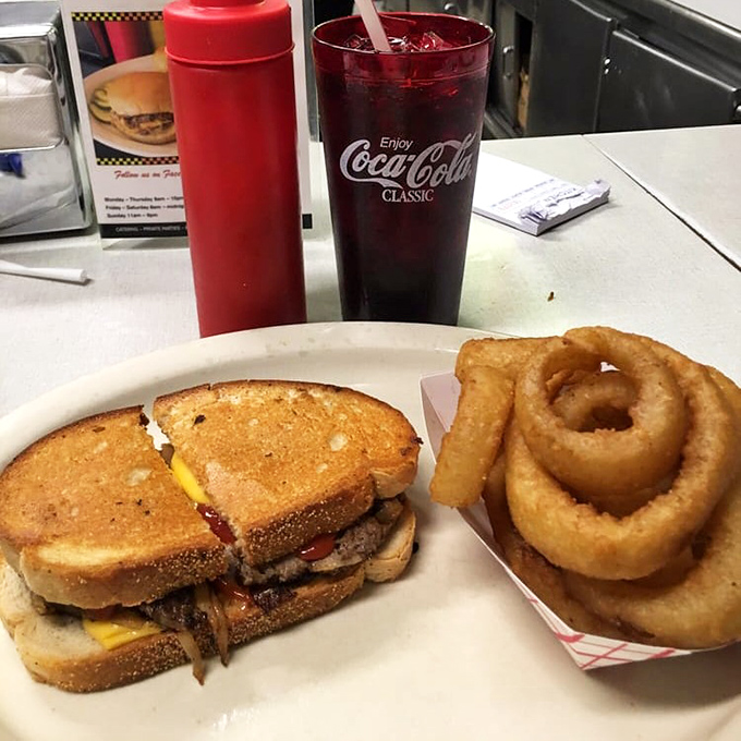 The patty melt: where burger meets sandwich in a glorious union of griddled rye, melted cheese, and beef. Comfort food that hugs your soul.