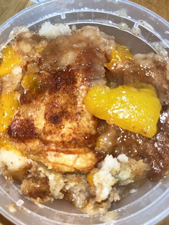 Peach cobbler looking like summer decided to stick around&mdash;fruity, golden, and absolutely worth the extra unbuttoned notch.