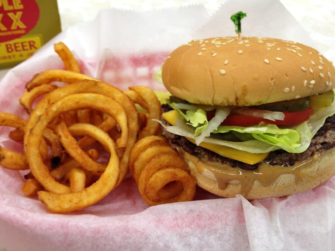 Behold the Duane Purvis All-American: a burger topped with peanut butter that sounds like culinary madness until that first bite converts you into an evangelist.