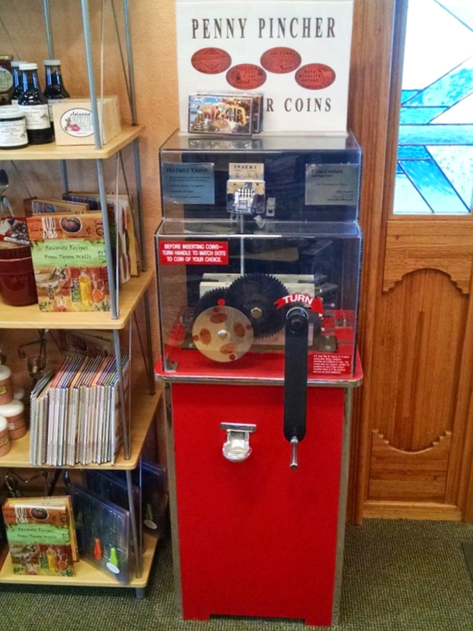 The Penny Pincher machine&mdash;where pocket change transforms into flattened souvenirs while your wallet breathes a sigh of relief.