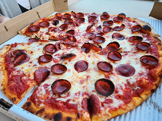 Pepperoni that curls into little flavor cups, holding precious pools of savory oil. This isn't just pizza—it's edible engineering at its finest.