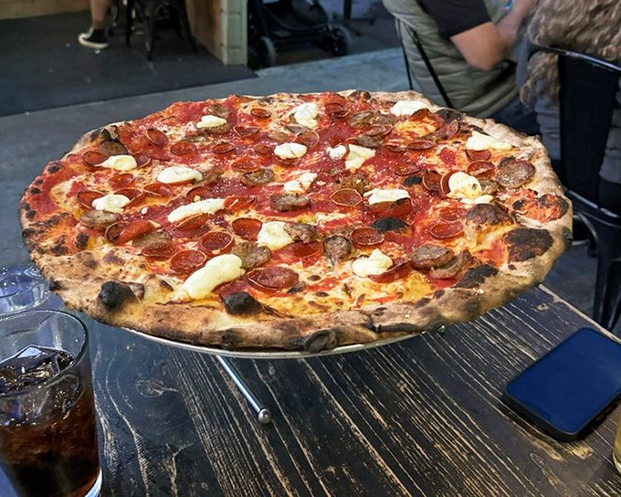 Pizza perfection doesn't need to shout&mdash;it speaks in the language of perfectly charred crust, melty cheese, and pepperoni cups that cradle tiny pools of flavor.