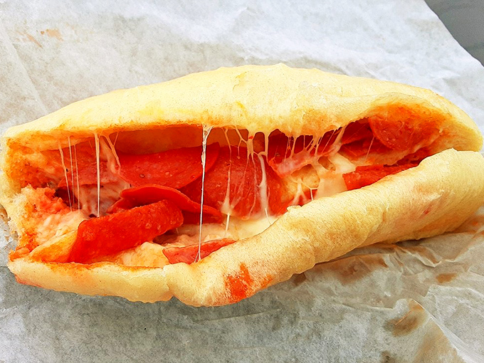 The legendary pepperoni roll in all its glory &ndash; where pillowy dough meets spicy pepperoni in a relationship more perfect than any Hollywood romance.