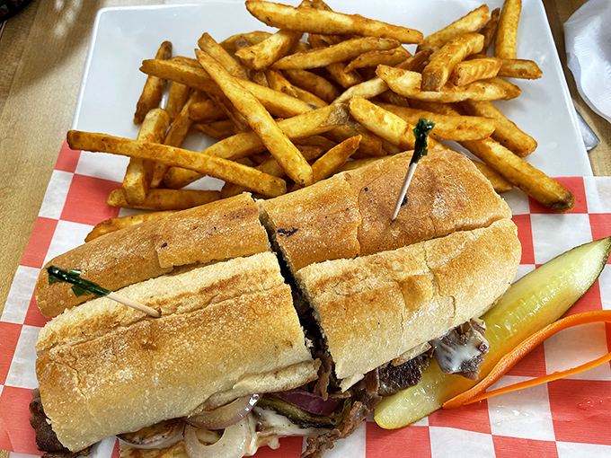 This isn't just a sandwich—it's an architectural marvel of beef, cheese, and bread that demands both hands and your full attention.