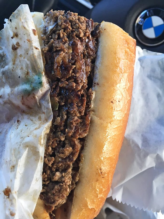 Behold the cheesesteak in its natural glory &ndash; tender beef, perfectly melted cheese, and a roll that deserves its own fan club.