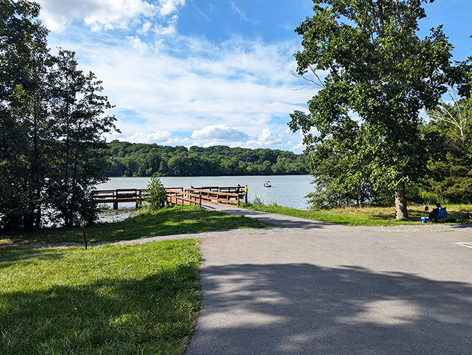 The dock that launched a thousand memories. This wooden pathway doesn't just lead to water&mdash;it's the starting point for fish tales that grow bigger each year.