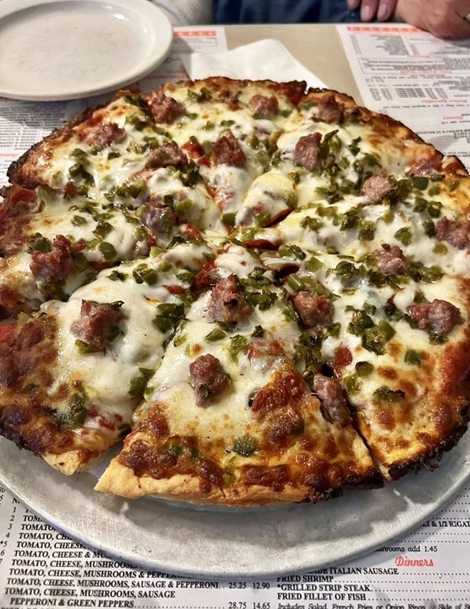 Luigi's sausage and green pepper pizza isn't just a meal&mdash;it's an edible work of art that's been perfecting its craft since before Instagram food photos existed.