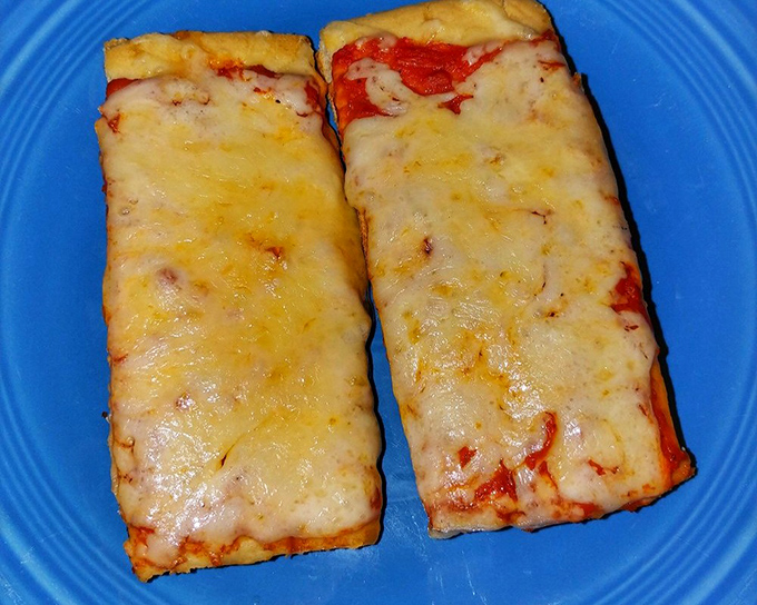 Old Forge's famous rectangular pizza &ndash; where cheese meets sauce in a geometric relationship that somehow makes more sense than most modern romances. 