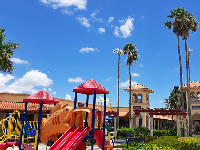Even retail-resistant children find joy here—this playground fish slide might be the only catch of the day that doesn't cost a thing.
