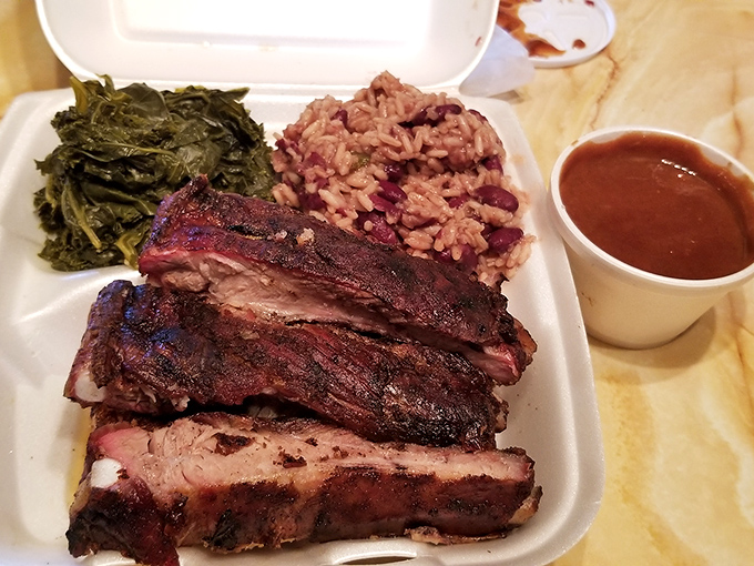 Pork ribs with that perfect pink smoke ring, tender greens, and red beans and rice. The holy trinity of Southern-inspired Pittsburgh perfection.