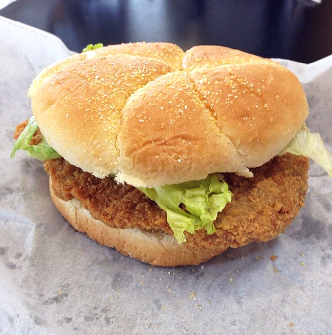Breaded perfection nestled in a pillowy bun with crisp lettuce. This sandwich doesn't need to shout—it lets the crunch do the talking.