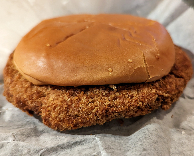 The legendary pork tenderloin &ndash; golden-brown perfection that laughs at the concept of bun-to-meat ratio. Indiana's edible badge of honor.