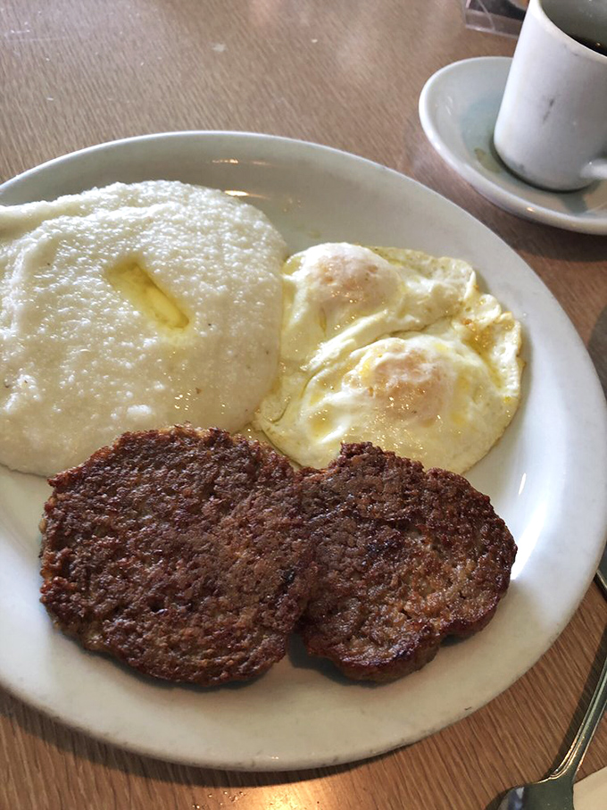 Grits, eggs, and sausage patties—the holy trinity of breakfast that's turned countless mornings from mundane to magnificent.