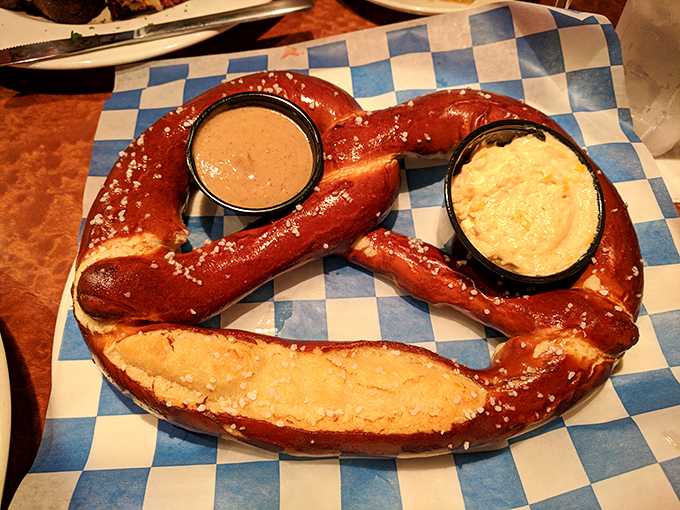 Not just any pretzel&mdash;this glistening, salt-flecked beauty with its dual dipping companions is what carb dreams are made of. Worth every delicious calorie.
