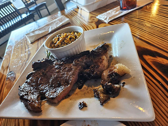 A prime rib that's seen just enough heat to transform from raw to remarkable. The roasted corn side dish is the unsung hero of this plate.