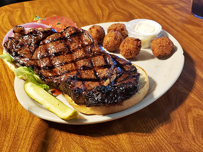This isn't just a steak sandwich; it's a masterclass in simplicity. Perfect grill marks, proper bread-to-meat ratio, and zero pretension.