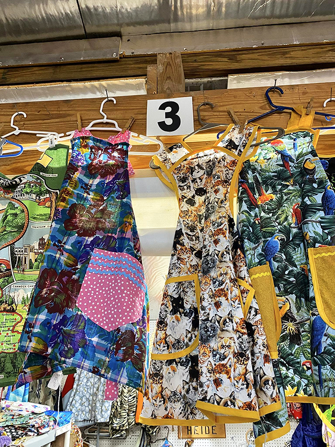 Fashion meets whimsy with these eye-catching aprons &ndash; the cat-covered one practically begging to be worn at your next dinner party.