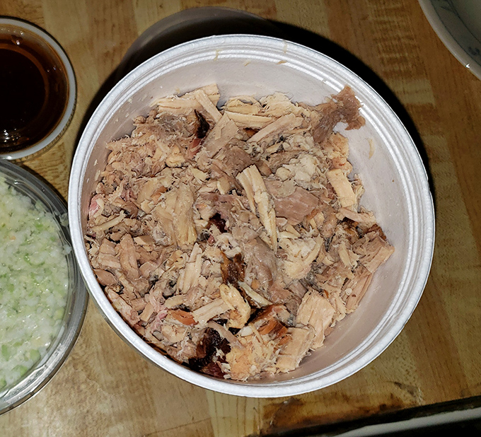 Pulled pork that's been coaxed, not forced, into tender submission. Each strand carries the perfect balance of smoke, spice, and Southern charm.