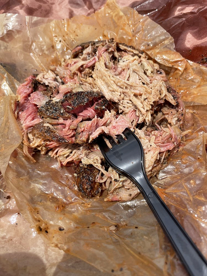 Pulled pork so tender it practically surrendered to the fork before you even touched it. The perfect marriage of smoke, meat, and time.