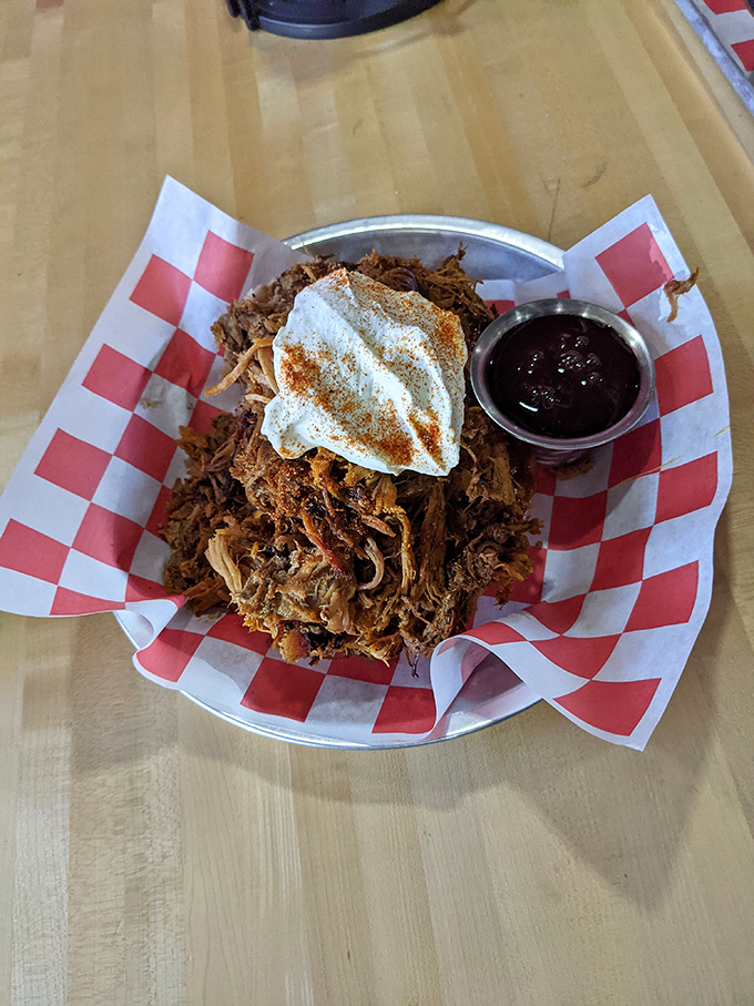 Pulled pork that's had a proper introduction to smoke and spice. That white topping isn't snow in Indiana&mdash;it's coleslaw adding the perfect contrast.