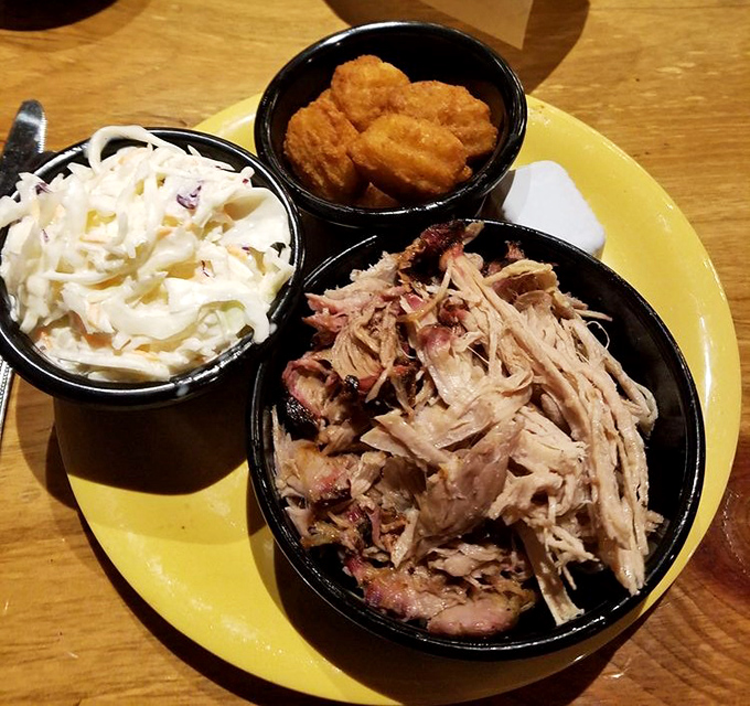 Pulled pork that's had a proper introduction to smoke, served with coleslaw and hush puppies – the holy trinity of Southern comfort in PA.