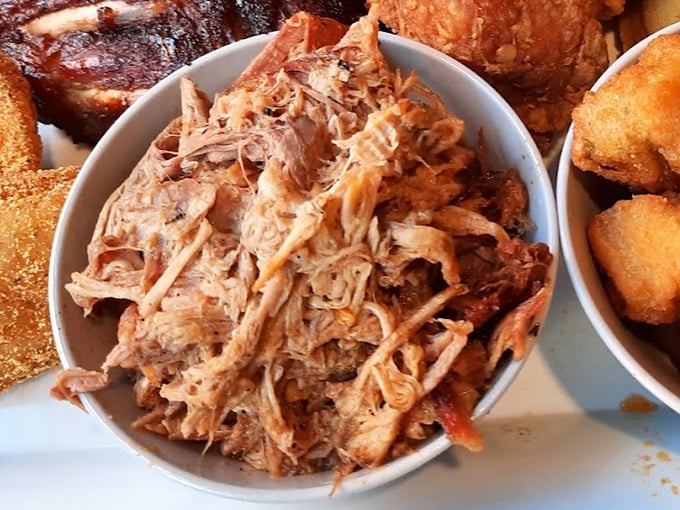 Pulled pork so tender it practically pulled itself. The kind of barbecue that makes you want to cancel your afternoon plans.
