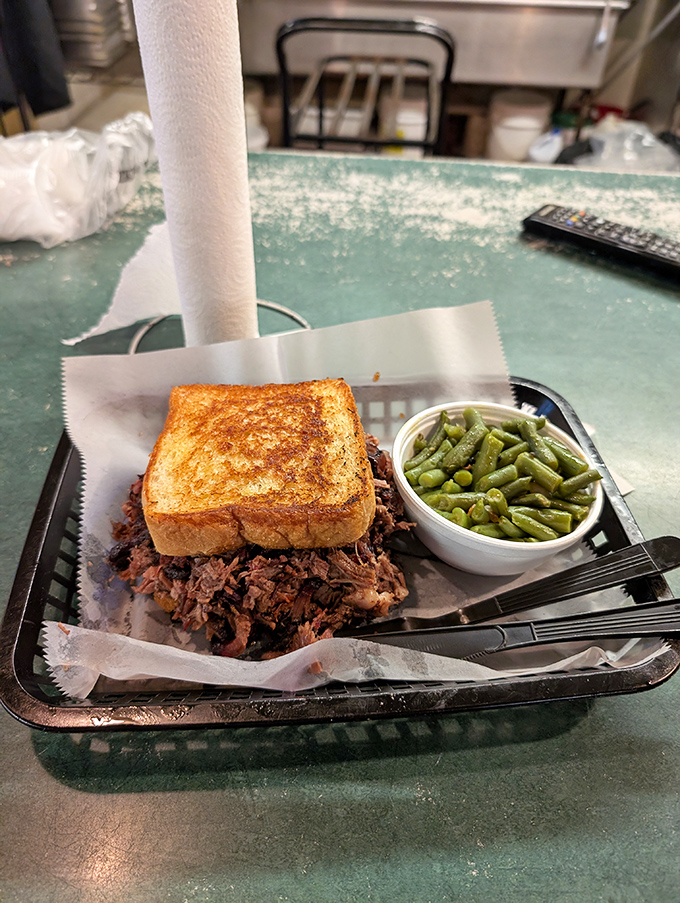 Toast meets smoke in a sandwich that's worth crossing county lines for. The pulled pork practically melts into that golden bread.