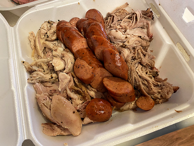 
Meat matrimony at its finest. The pulled chicken and sausage duo is like the Fred Astaire and Ginger Rogers of barbecue&mdash;elegant yet soulful.