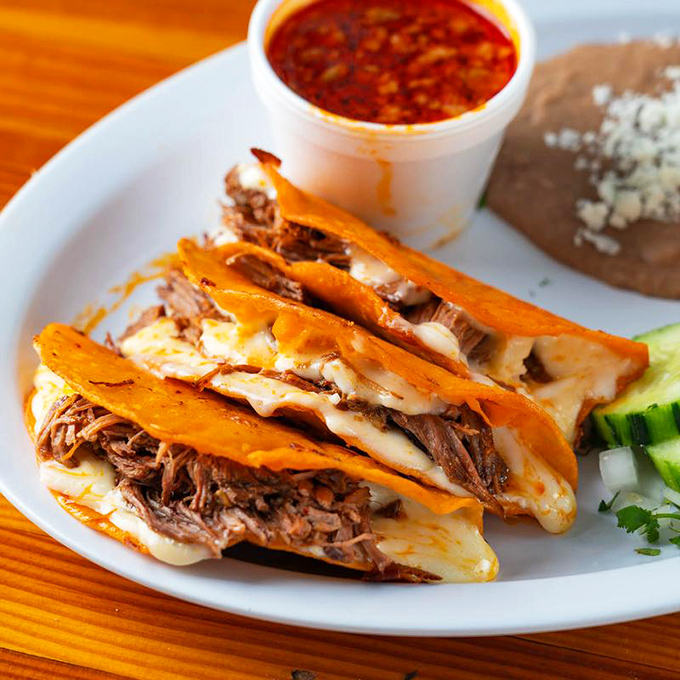 Quesabirria tacos: where slow-cooked beef meets melty cheese in a relationship so perfect, it should have its own reality show.