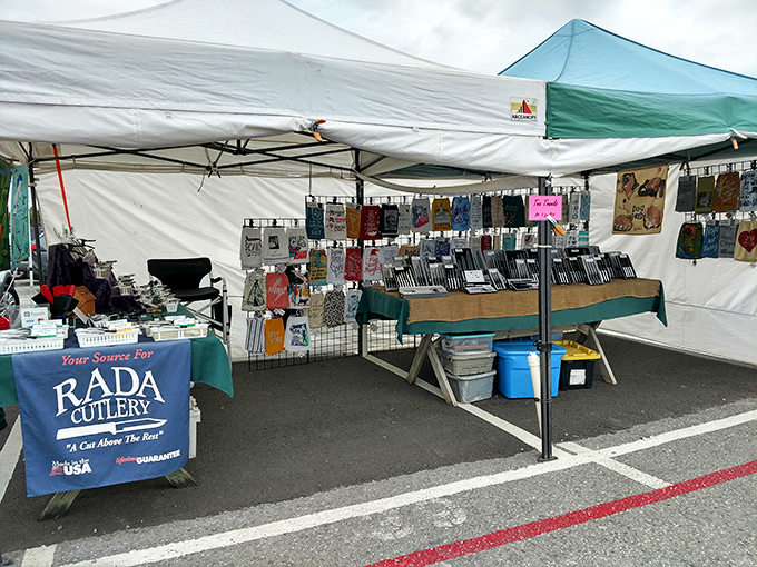 Outdoor vendors bring their A-game with quality American-made Rada cutlery. The knife-to-kitchen-towel ratio here suggests serious cooking happens in Tennessee homes.