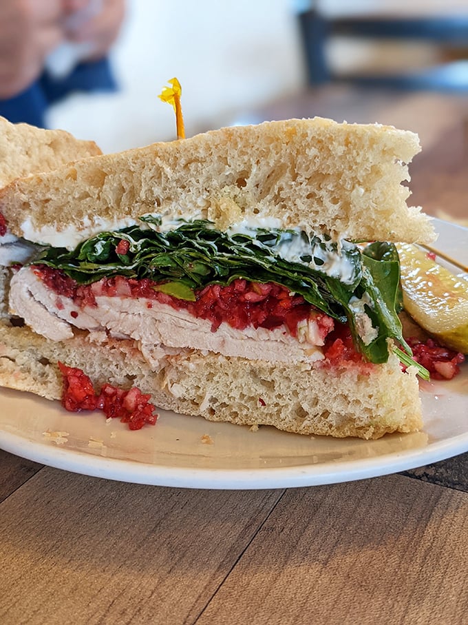 The Turkey Cran sandwich in its natural habitat&mdash;halfway between being admired and devoured. That cranberry relish deserves its own fan club.