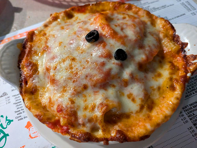 Two perfect half-moons of ravioli swimming in a sea of bright tomato sauce. Simplicity that speaks volumes about why we still crave Italian-American comfort food.