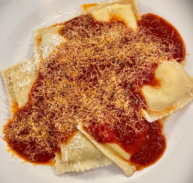 Ravioli swimming in red sauce and showered with cheese &ndash; proof that the simplest pleasures are often the most profound.