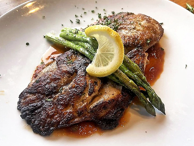 This red snapper with asparagus isn't just dinner; it's edible evidence that simplicity, when executed perfectly, is culinary poetry.