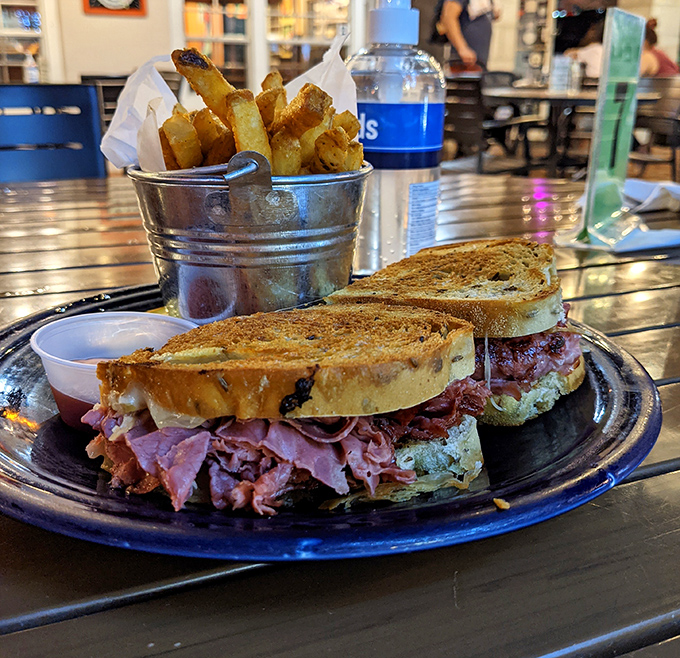 A Reuben that doesn't skimp on the good stuff&mdash;this isn't some corporate portion-controlled sandwich, this is sandwich artistry.