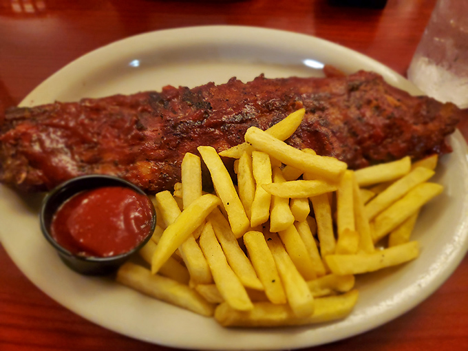 These ribs aren't falling off the bone&mdash;they're voluntarily leaping into flavor paradise with golden fries as their sidekick.