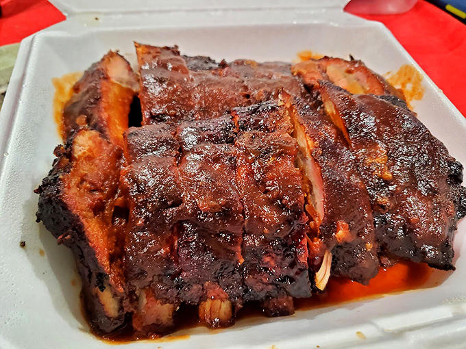 Ribs glistening with sauce and sporting that telltale smoke ring&mdash;the kind that make you temporarily forget table manners exist.