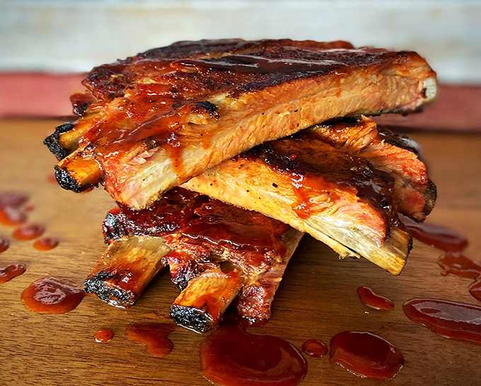 These ribs showcase the kind of bark and tenderness that separates weekend warriors from true pit masters.