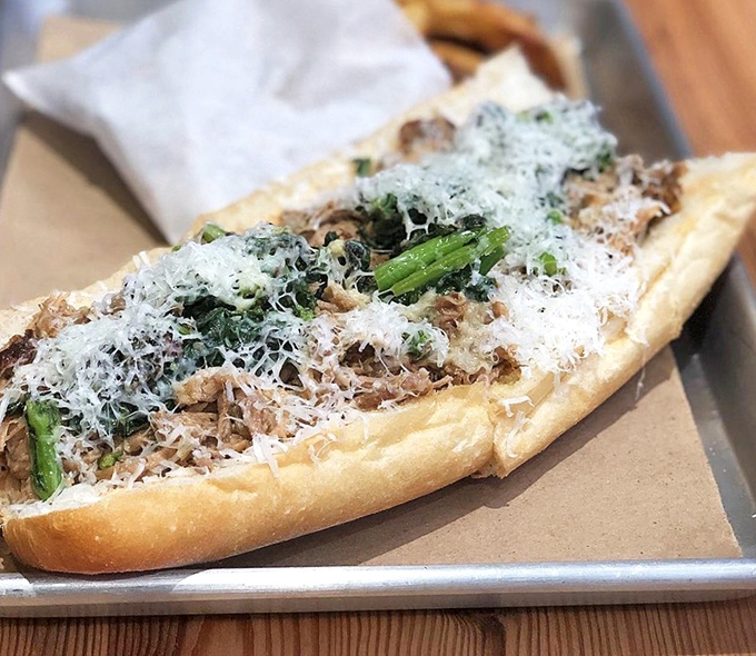 Roast pork, sharp greens, and a shower of parmesan&mdash;this sandwich doesn't need to shout to make its delicious point.