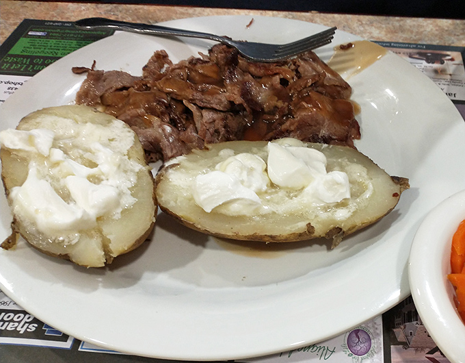 Baked potatoes loaded with butter that would make Paula Deen blush. Simple food done right never goes out of style.