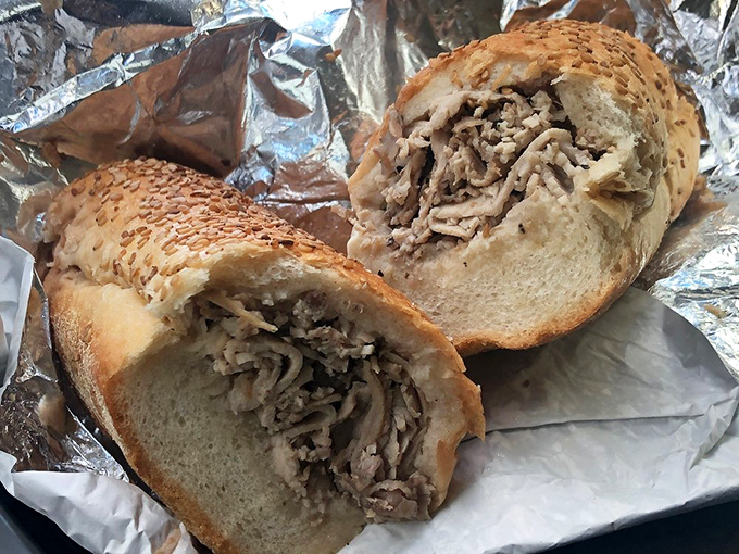 Behold the roast pork sandwich in its natural habitat &ndash; tender, thinly-sliced meat piled generously on a roll that knows its important role in history.