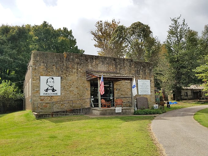 This stone building with its welcoming porch and American flag stands as a gateway to Rock Port's rich history and warm hospitality.