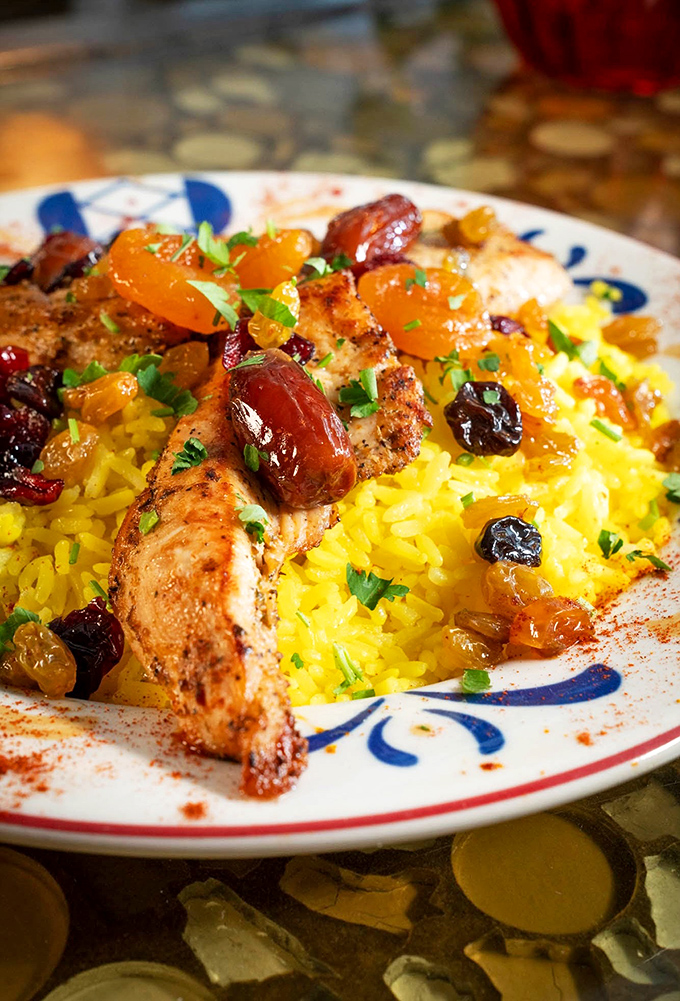Saffron rice so golden and aromatic, it practically glows with Mediterranean sunshine on your plate.