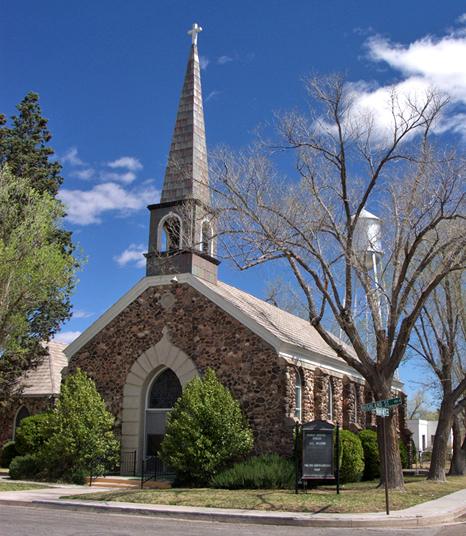 This charming stone church reaches skyward with its dramatic spire, offering spiritual solace and architectural beauty in equal measure.