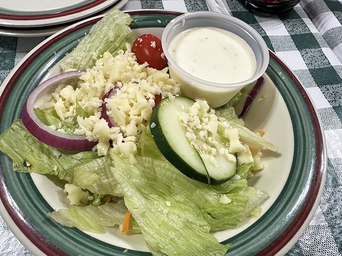 A house salad that doesn't apologize for being simple. Crisp, fresh, and the perfect opening act before the carb-laden main event.