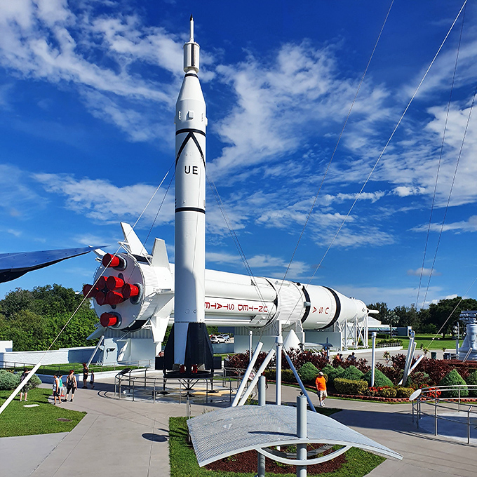 The Saturn IB rocket rests horizontally, its massive engines silent but still speaking volumes about human ingenuity.
