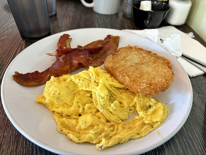 Fluffy scrambled eggs that prove sometimes the simplest dishes require the most skillful hands.