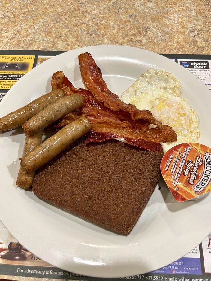 The Pennsylvania Dutch breakfast trifecta: crispy bacon, sausage links, and scrapple&mdash;that mysterious local delicacy that divides humanity into believers and skeptics.